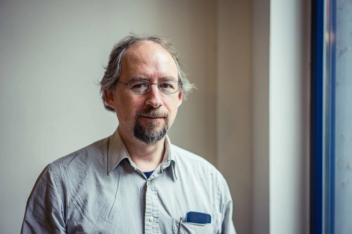 Who Adam Back is and his involvement in bitcoin development.